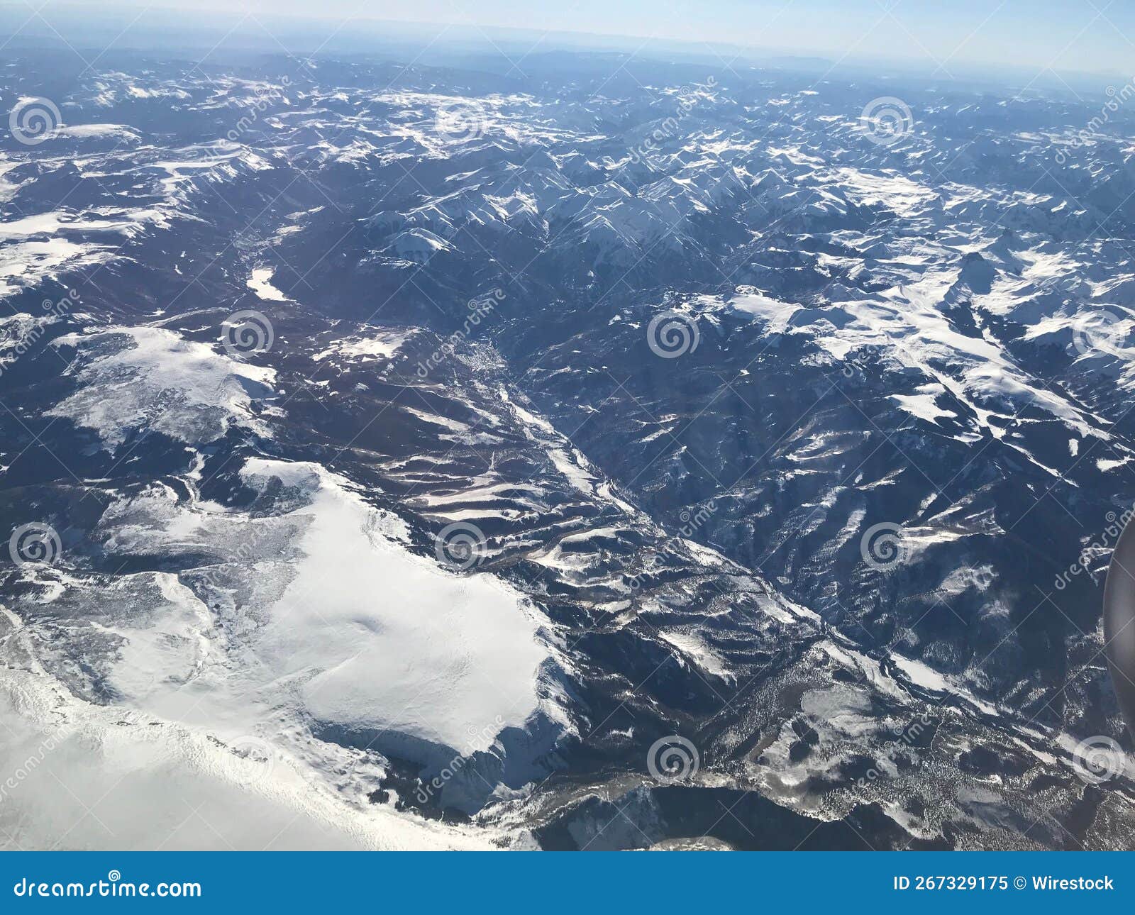 Aerial Shot of a Snow-covered Mountain Range Stock Image - Image of ...