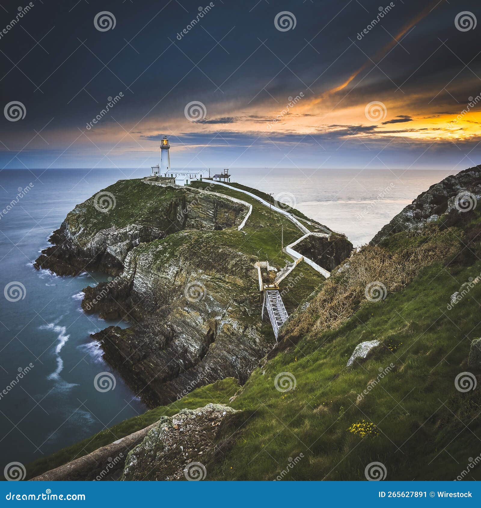 Aerial Shot of South Stack Lighthouse on a Cliff Under the Dramatic ...