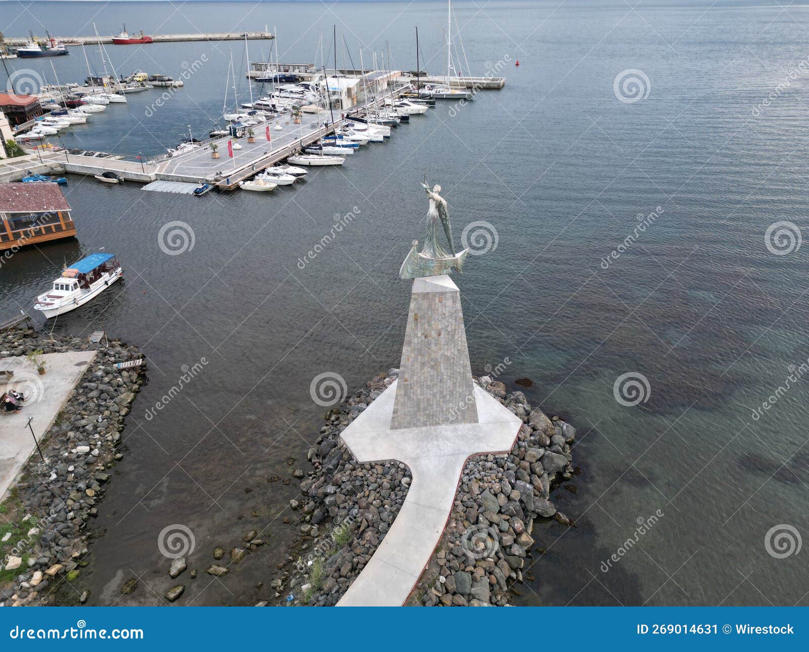 Aerial Shot of Statue of St. Nicholas and Boats in a Harbor in Nessebar ... Aerial Shot of Statue of St. Nicholas and Boats in a Harbor in Nessebar ...
