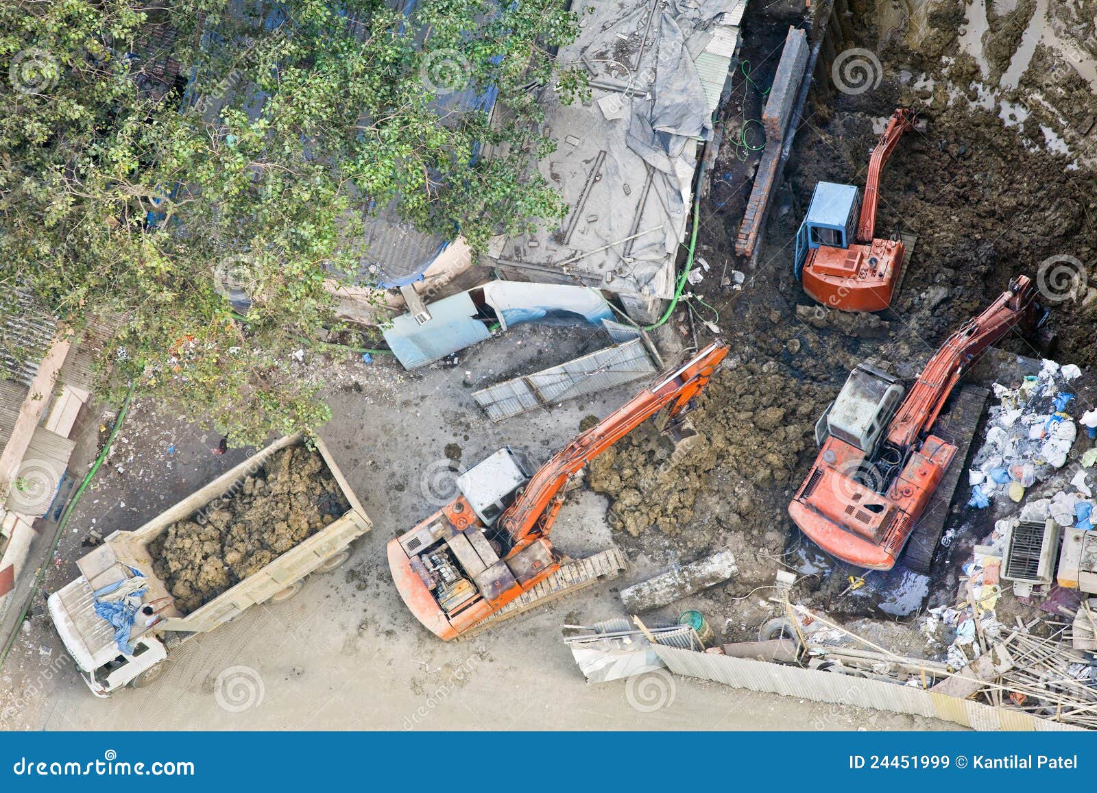 Aerial of Three Diggers Moving Earth Stock Image - Image of concrete ...