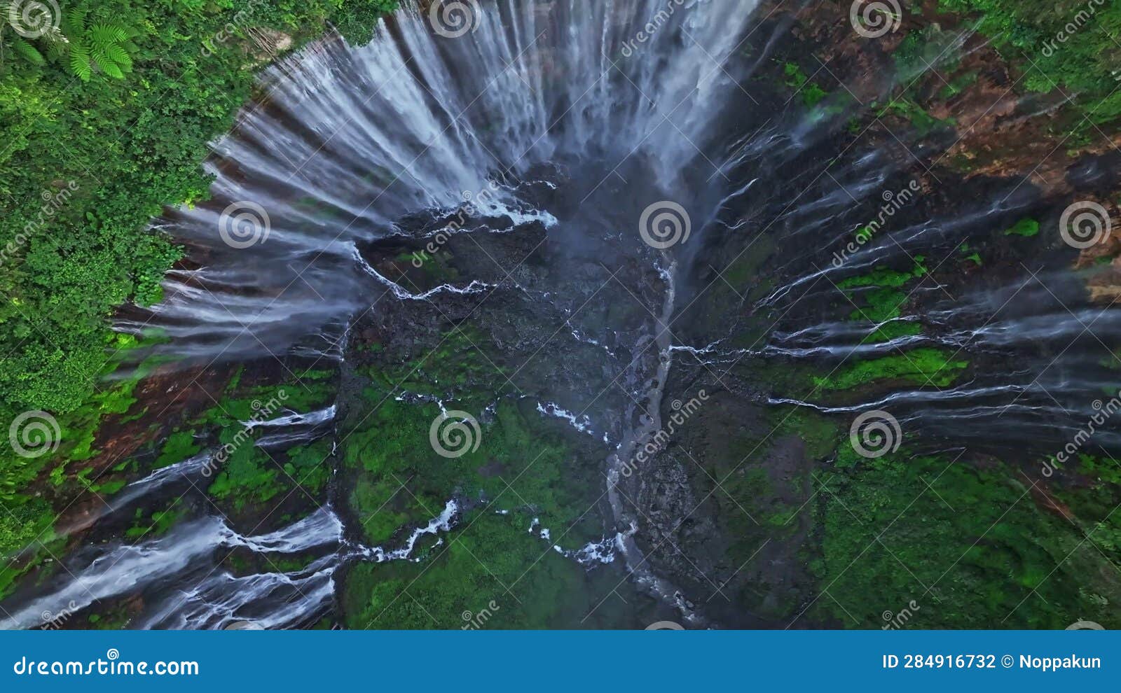 Aerial Top View Drone Rise Up and Spin from Bottom of Tumpak Sewu ...