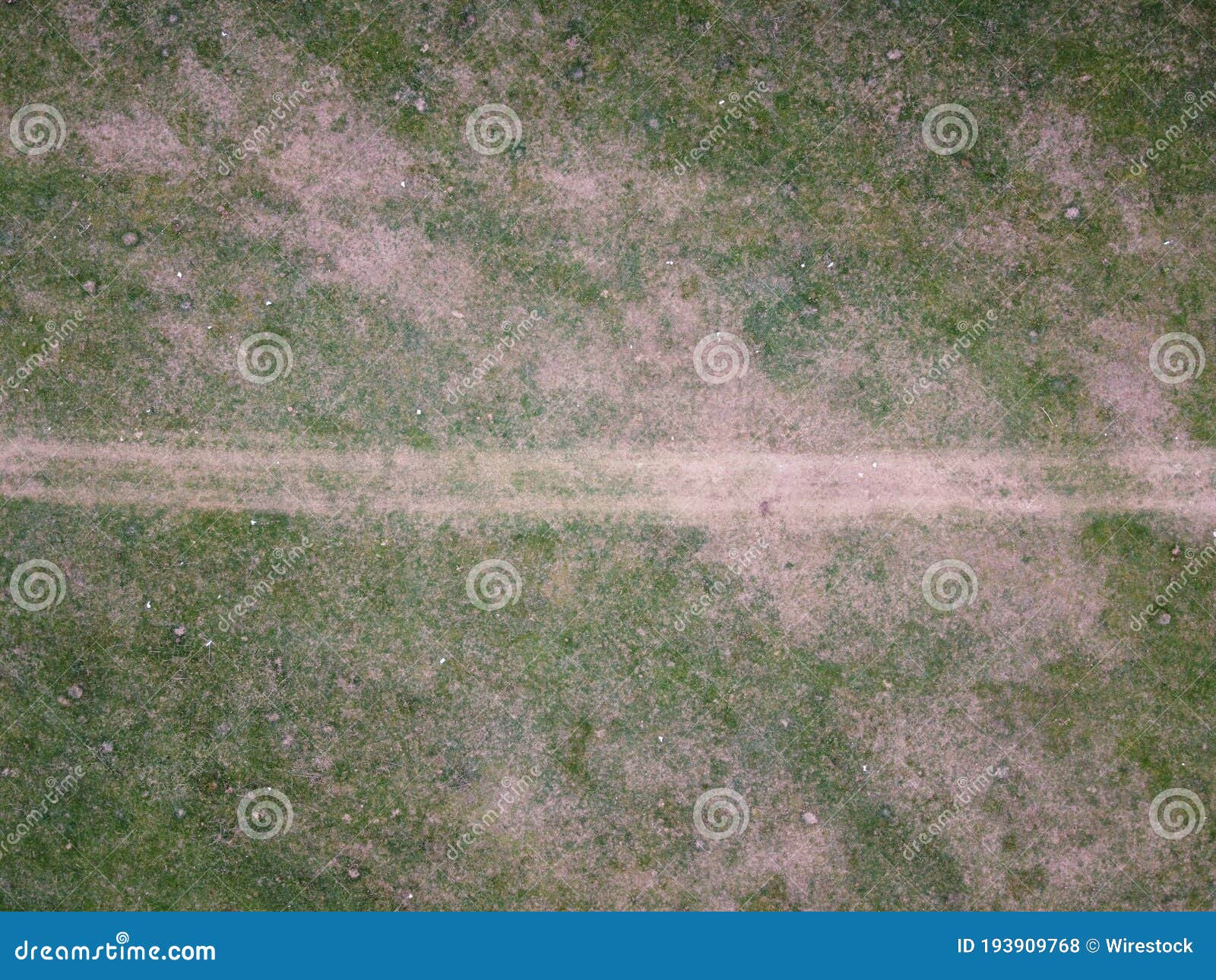 Aerial Top View Shot of a Trail of Wheels in a Field Stock Photo ...