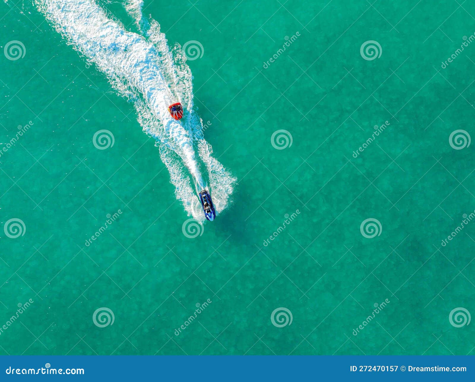 Aerial Top View of a Speed Boat Navigating the Open Ocean Performing ...