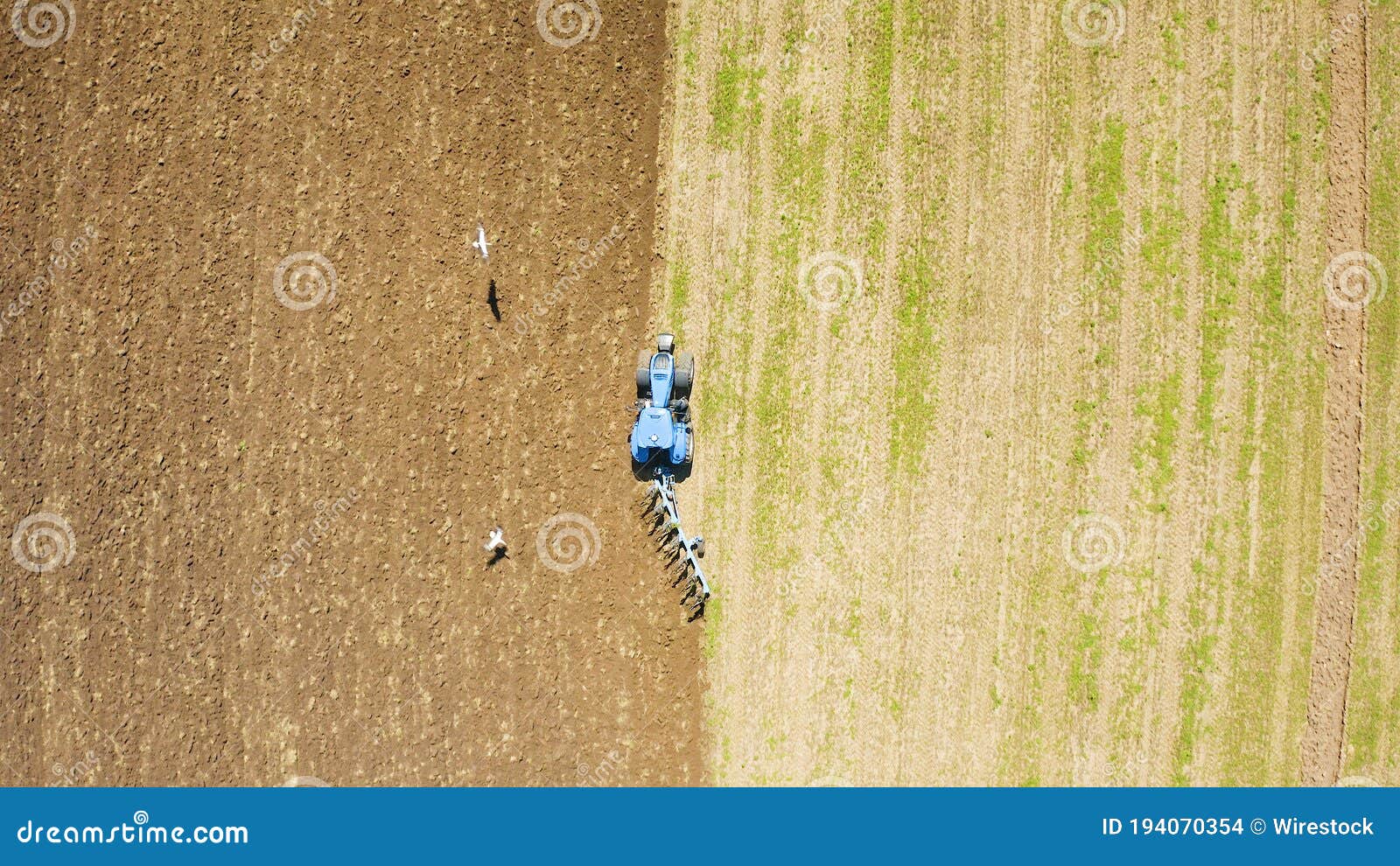 Aerial Top View of a Tractor on an Industrial Field Stock Photo - Image ...