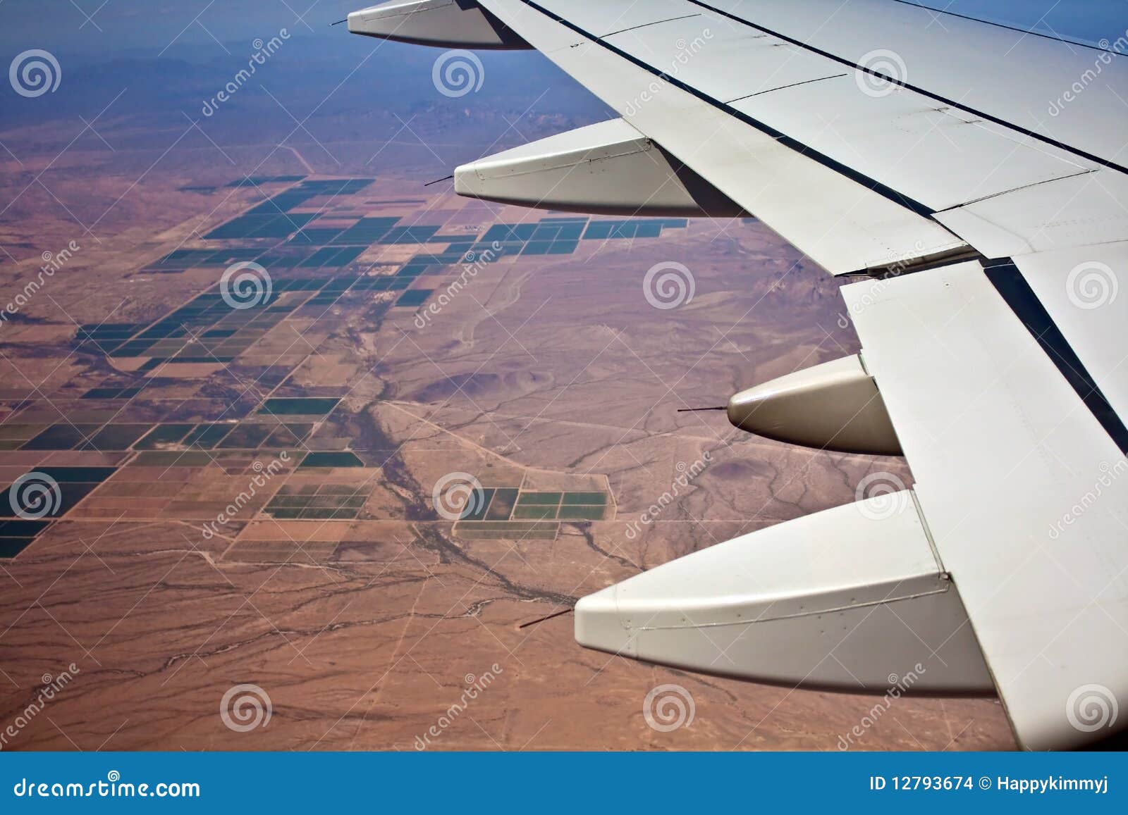 Aerial View of Airplane Wing Over Land Stock Photo - Image of plane ...