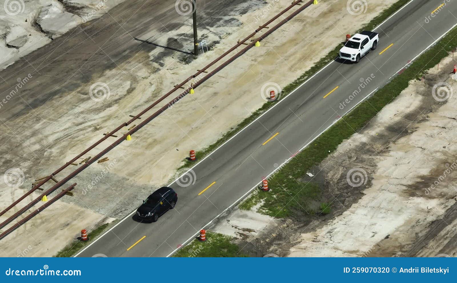 Aerial View of American Highway Under Construction with Moving Traffic ...