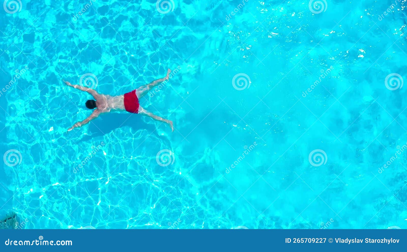 Aerial View As a Man Dives into the Pool and Swims Stock Video - Video ...