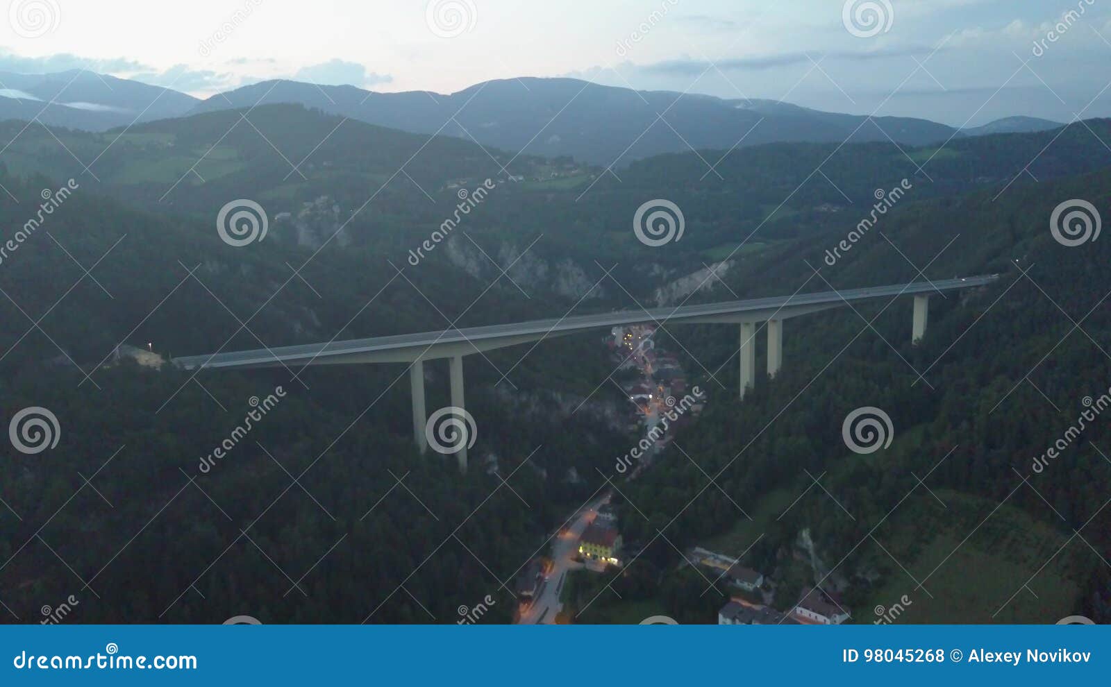 Aerial View of Austrian Highway Bridge Above Small Town in the Evening ...