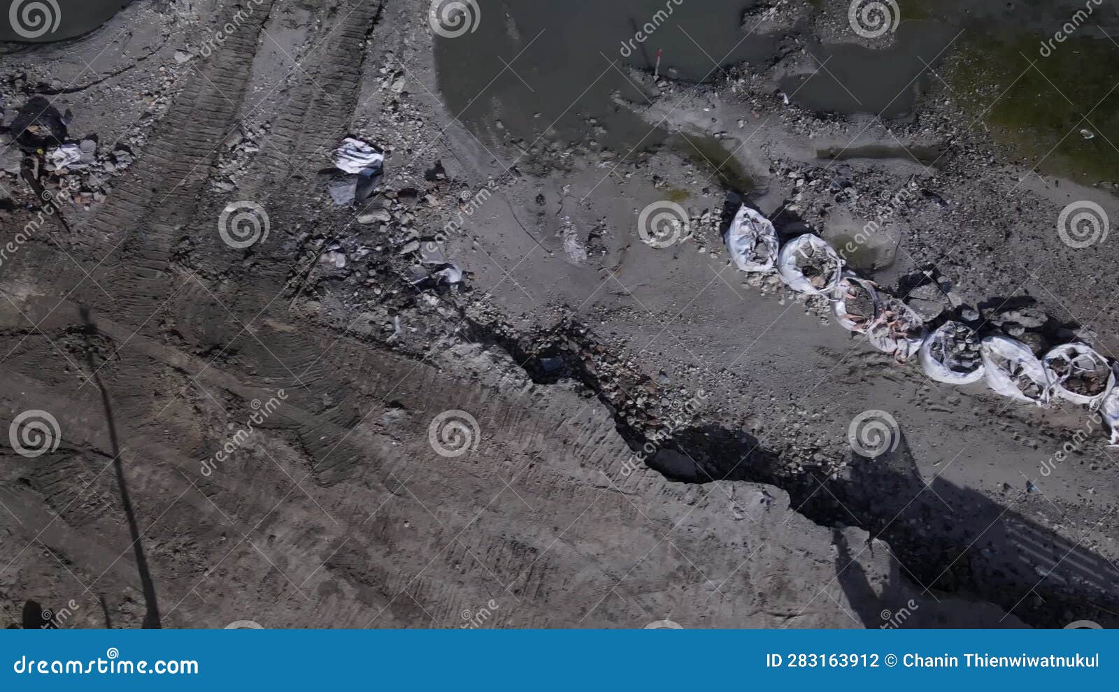 Aerial View of Backhoe Working on the Mud for Solve Pollution Problems ...
