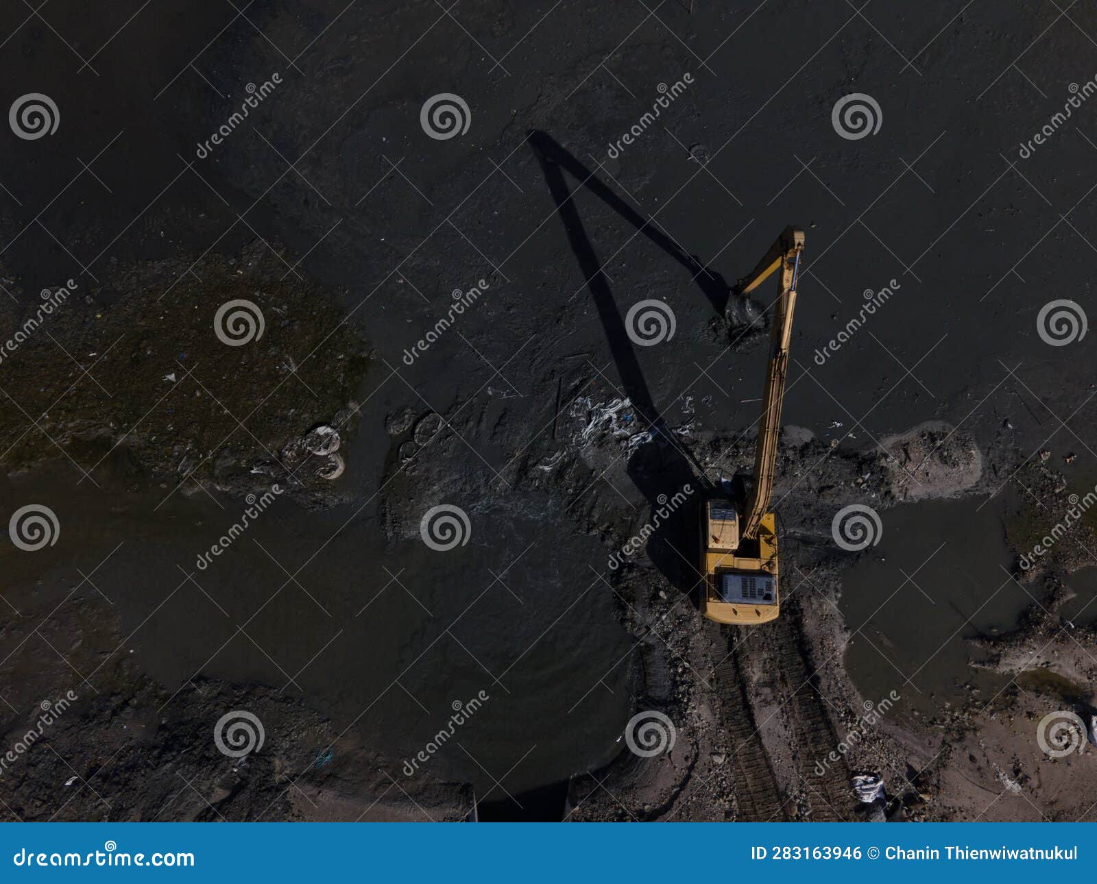 Aerial View of Backhoe Working on the Mud for Solve Pollution Problems ...