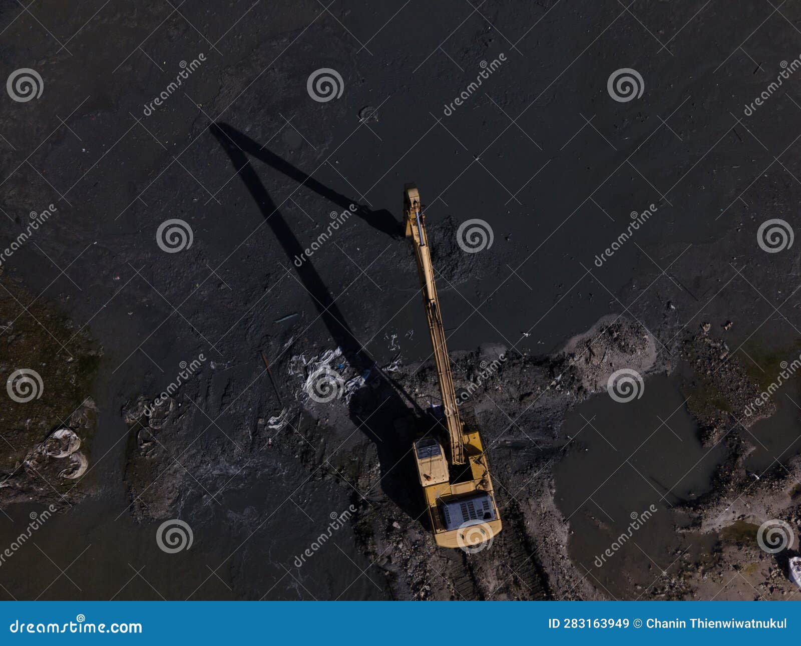 Aerial View of Backhoe Working on the Mud for Solve Pollution Problems ...