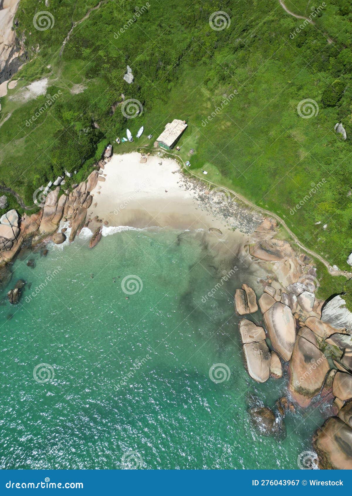Aerial View of a Beach with Greenery and Rocks Stock Image - Image of ...