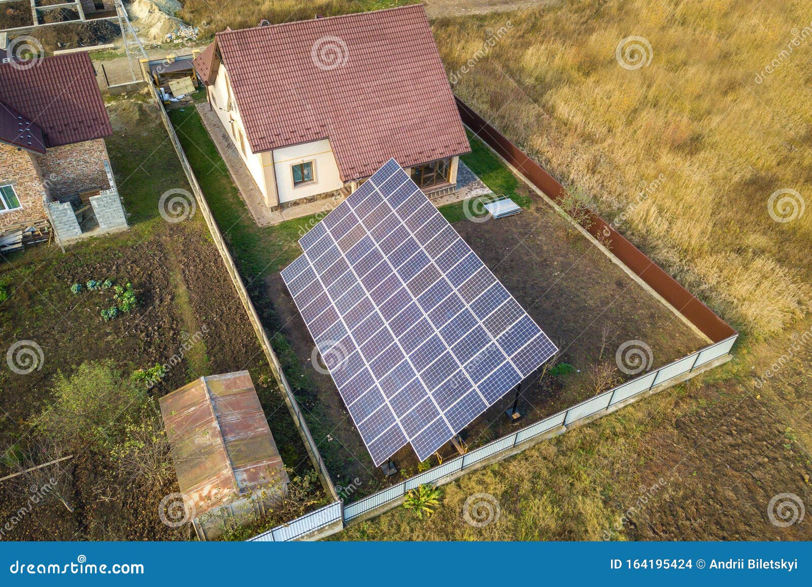 Aerial View of Big Blue Solar Panel Installed on Ground Structure Near ...
