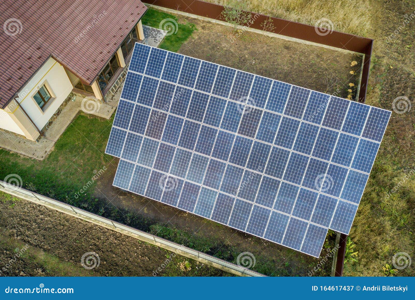 Aerial View of Big Blue Solar Panel Installed on Ground Structure Near ...