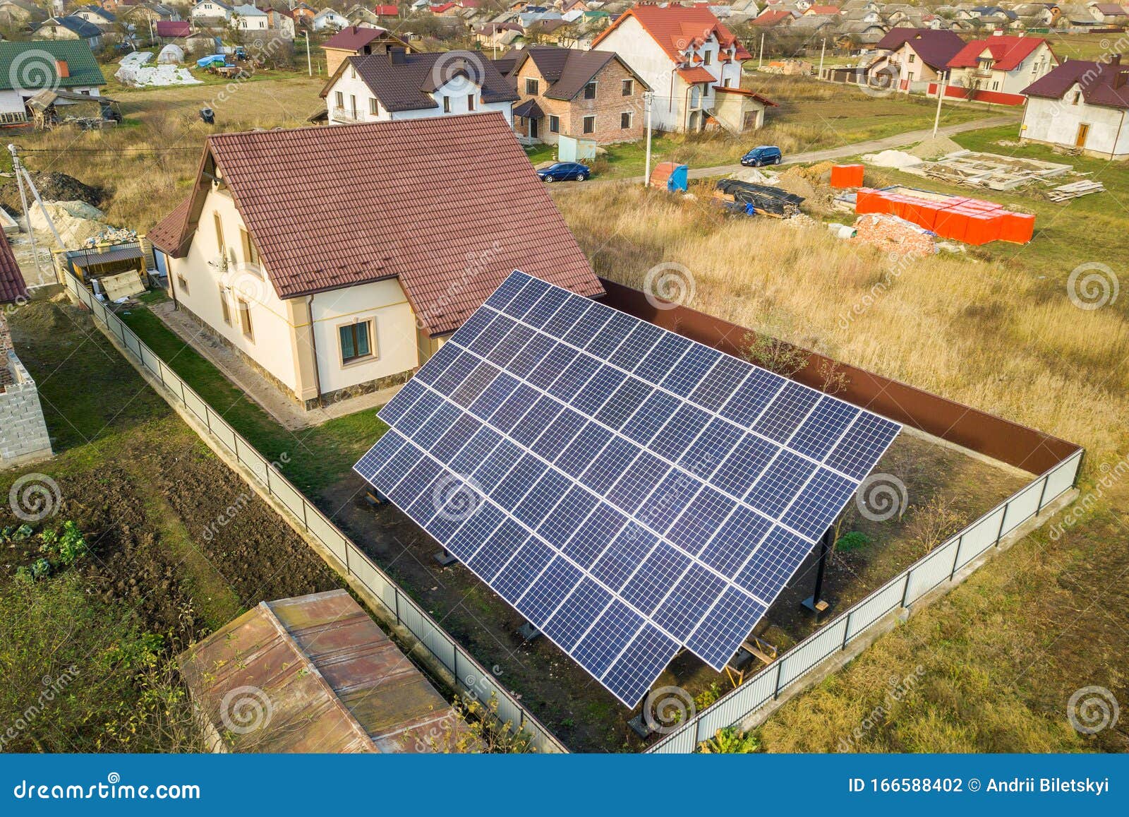Aerial View of Big Blue Solar Panel Installed on Ground Structure Near ...