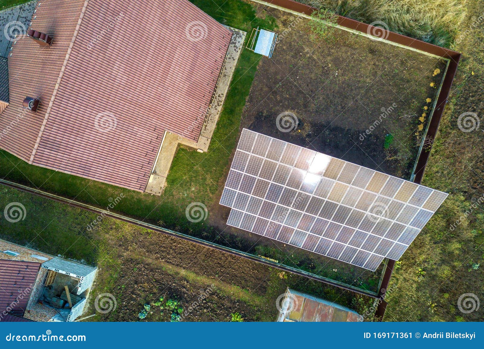 Aerial View of Big Blue Solar Panel Installed on Ground Structure Near ...