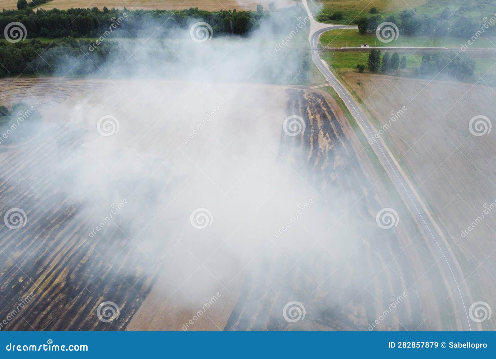 Aerial View of Burning Field with Smoke and Road Stock Image - Image of ...