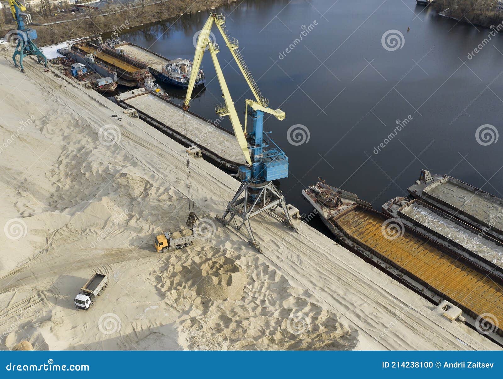 Aerial View of Cargo Port with Cranes Loading Sand on Barges Stock ...