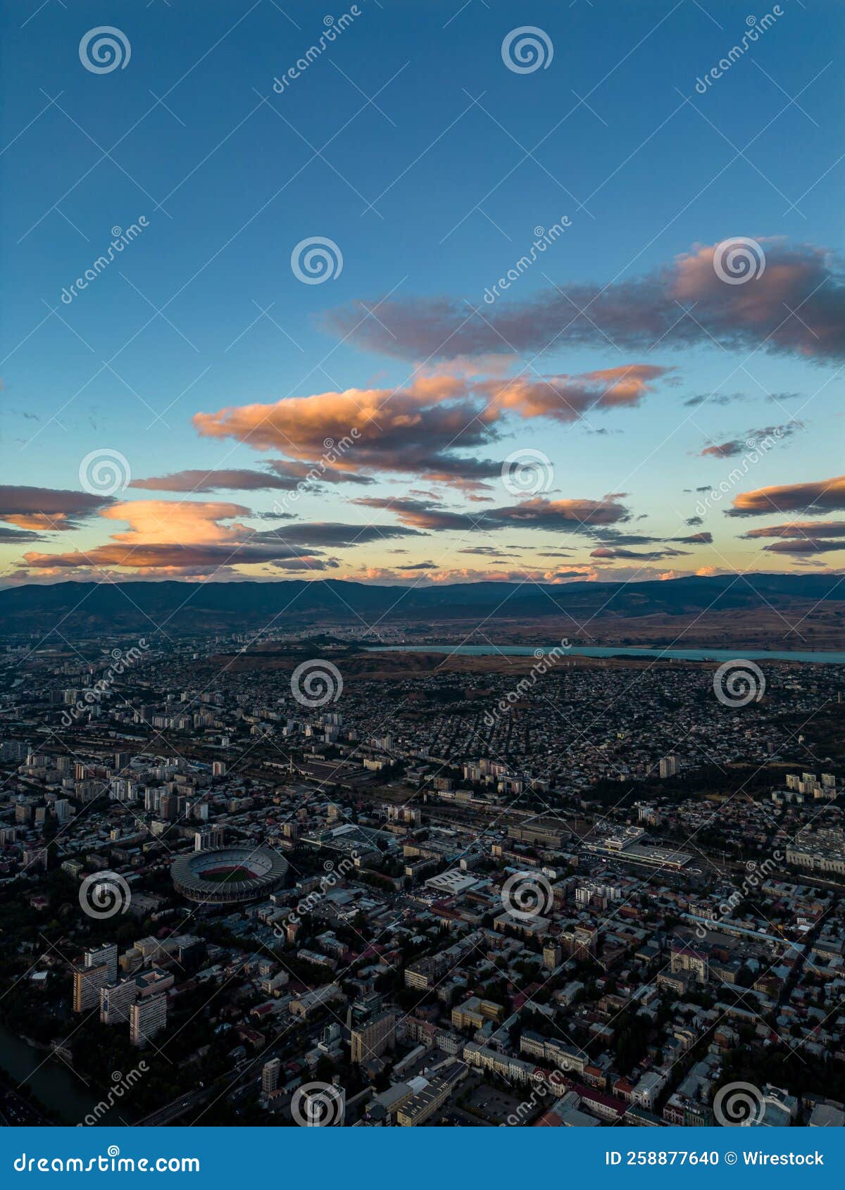Aerial View of a City and Landscape during Sunset Stock Photo - Image ...