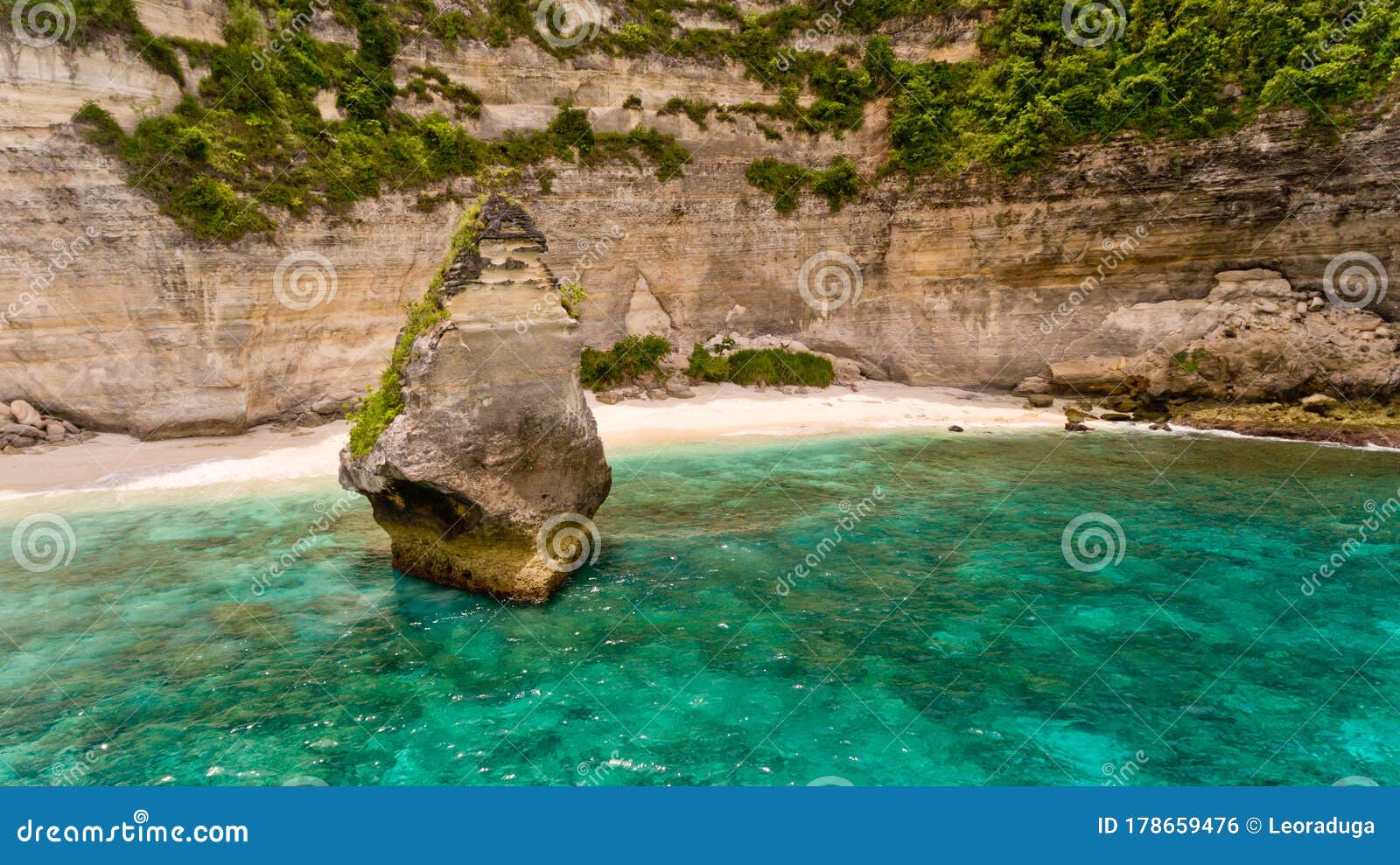 Aerial View of a Cliff in the Sea on the Beach. Stock Photo - Image of ...