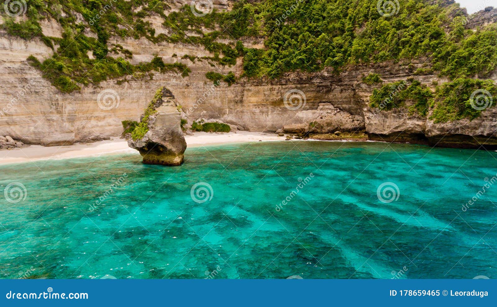 Aerial View of a Cliff in the Sea on the Beach. Stock Image - Image of ...