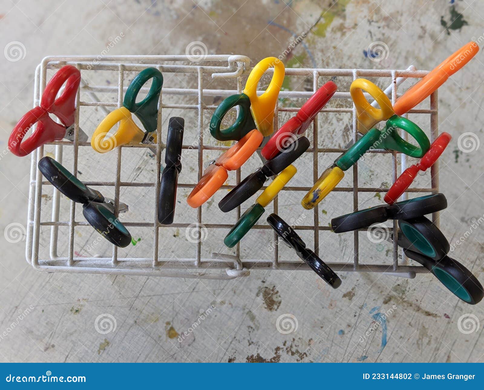 An Aerial View of a Collection of Classroom Scissors in a Rack Stock ...