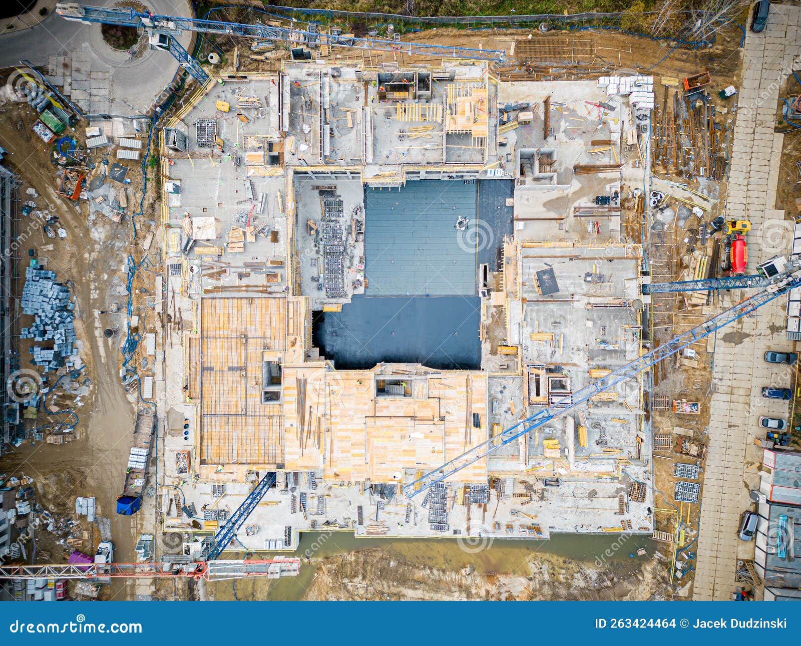 Aerial View of Construction Site with Crane and Building. Top View of Big Development ...