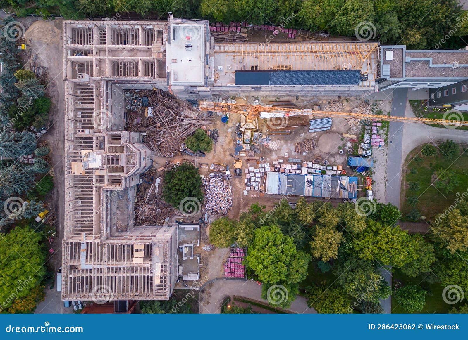 Aerial View of a Construction Site with a Crane Tower and Building ...