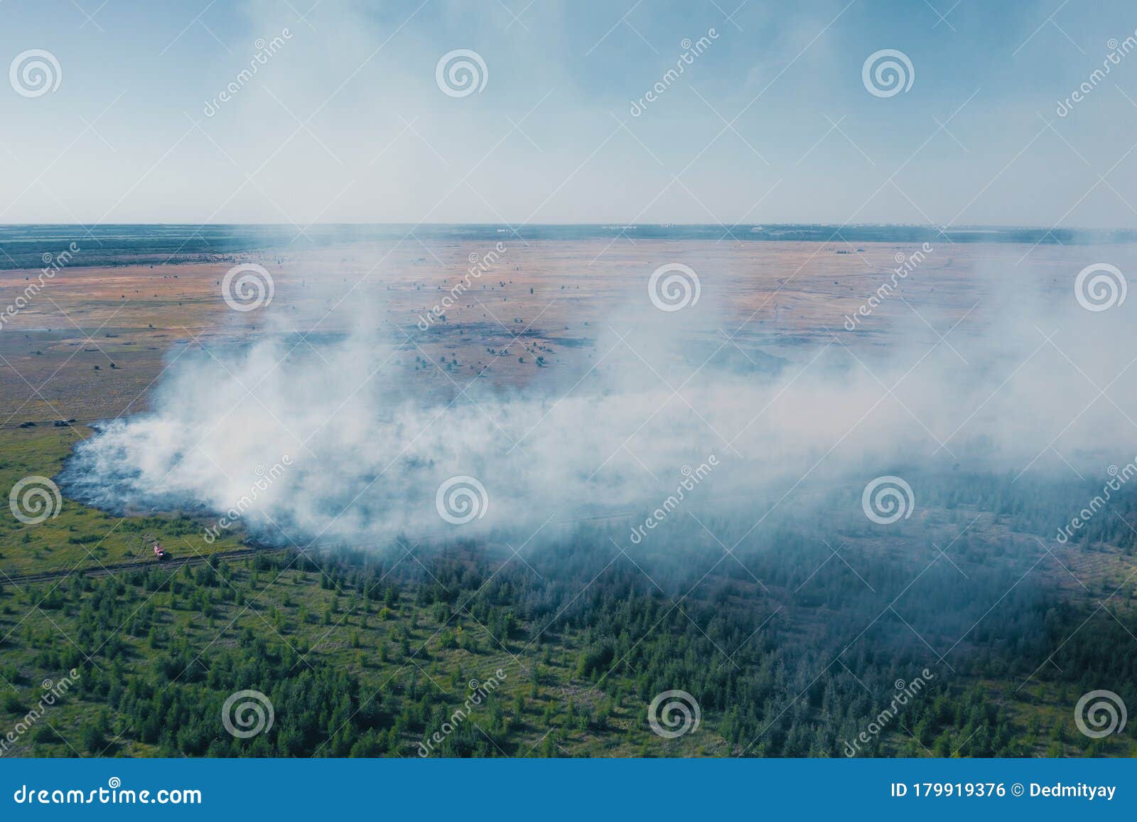 Aerial View of Controlled Bushfire or Fire in Forest among Green Fields ...