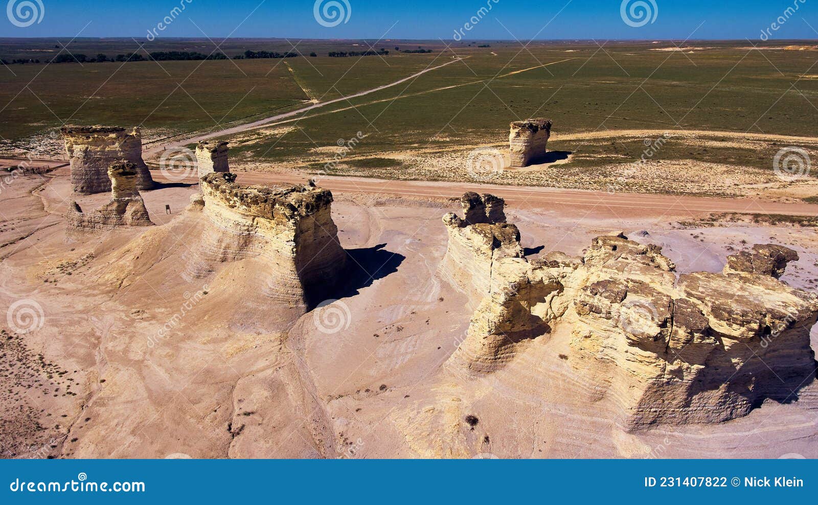 Aerial View of Desert Road with Pillars of White Rock in Unusual ...