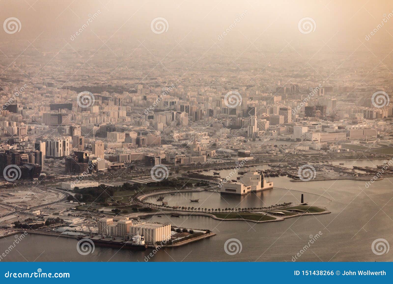 Aerial View of Doha, Qatar and Harbor with Haze and Dust Stock Photo ...