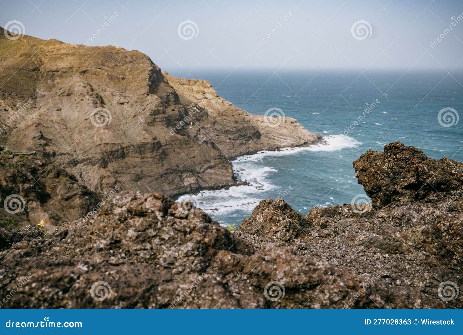 Aerial View of a Dramatic Rocky Cliff Overlooking the Vast Expanse of ...