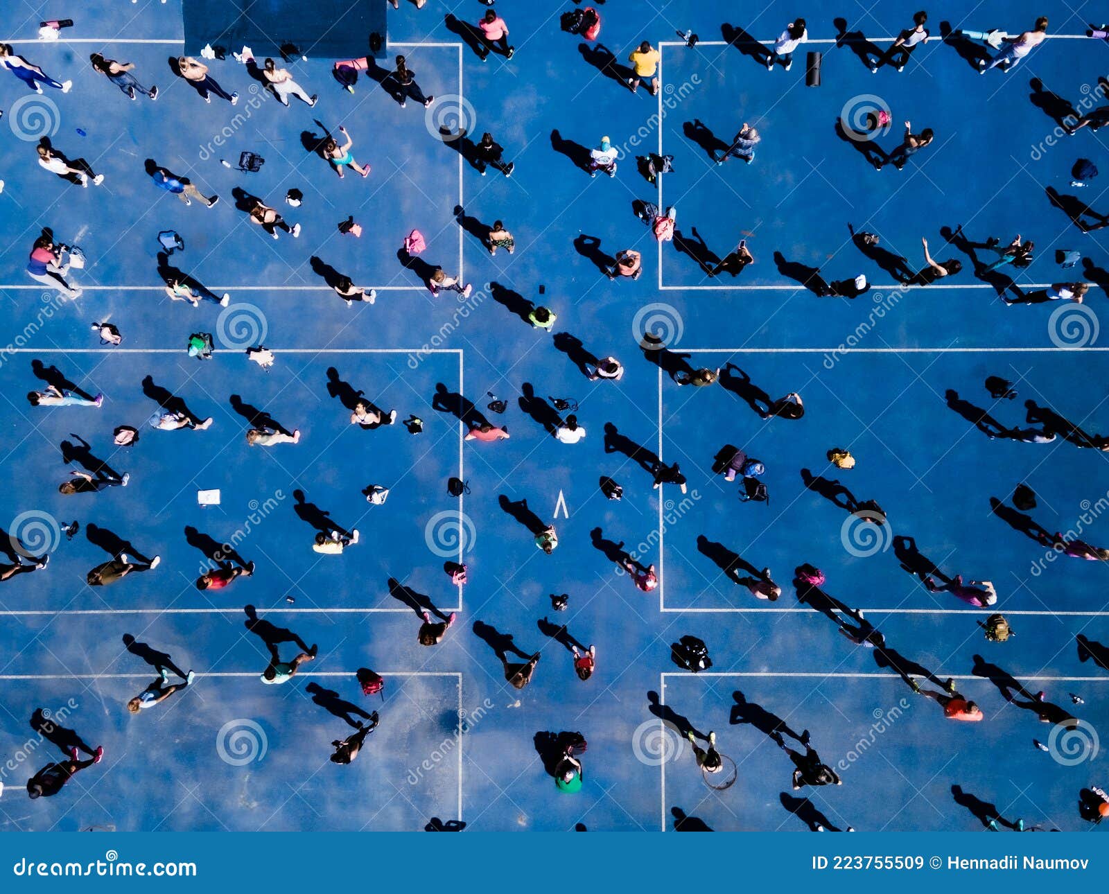 Aerial View from a Drone of a Group of People Doing Physical Exercise ...