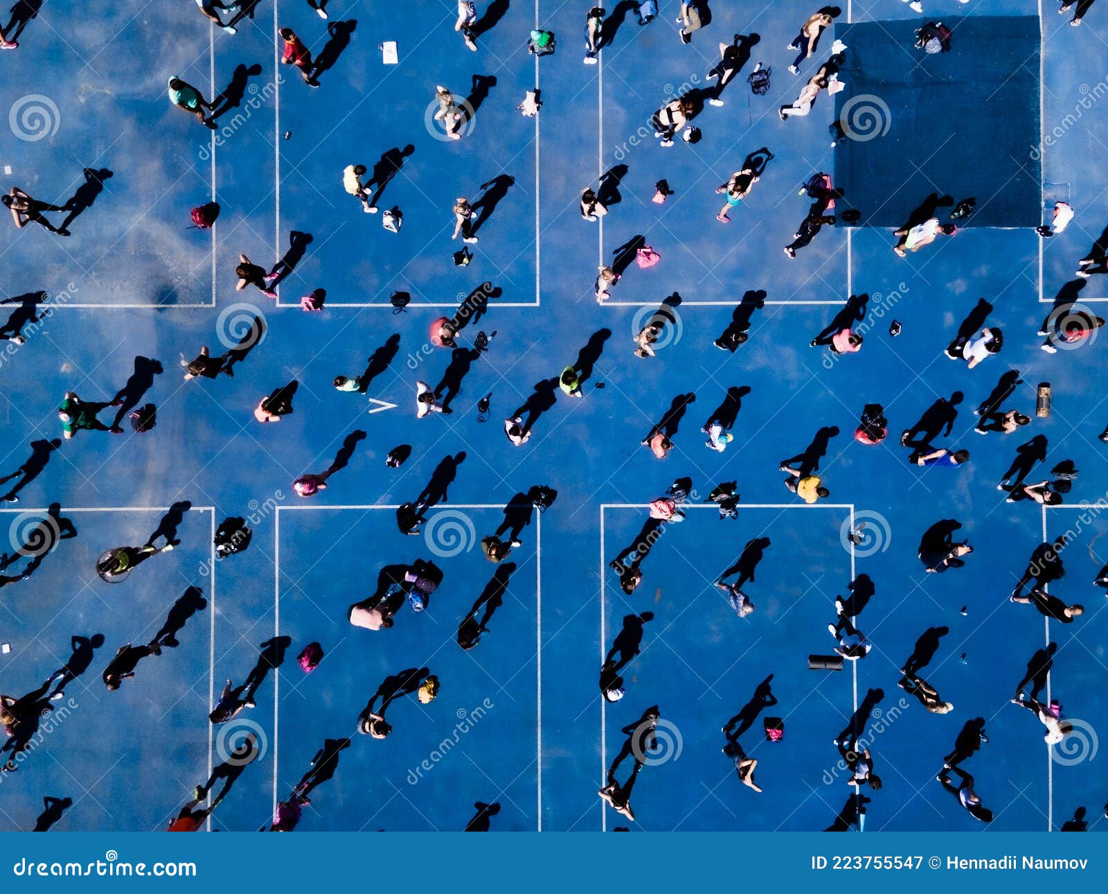 Aerial View from a Drone of a Group of People Doing Physical Exercise ...