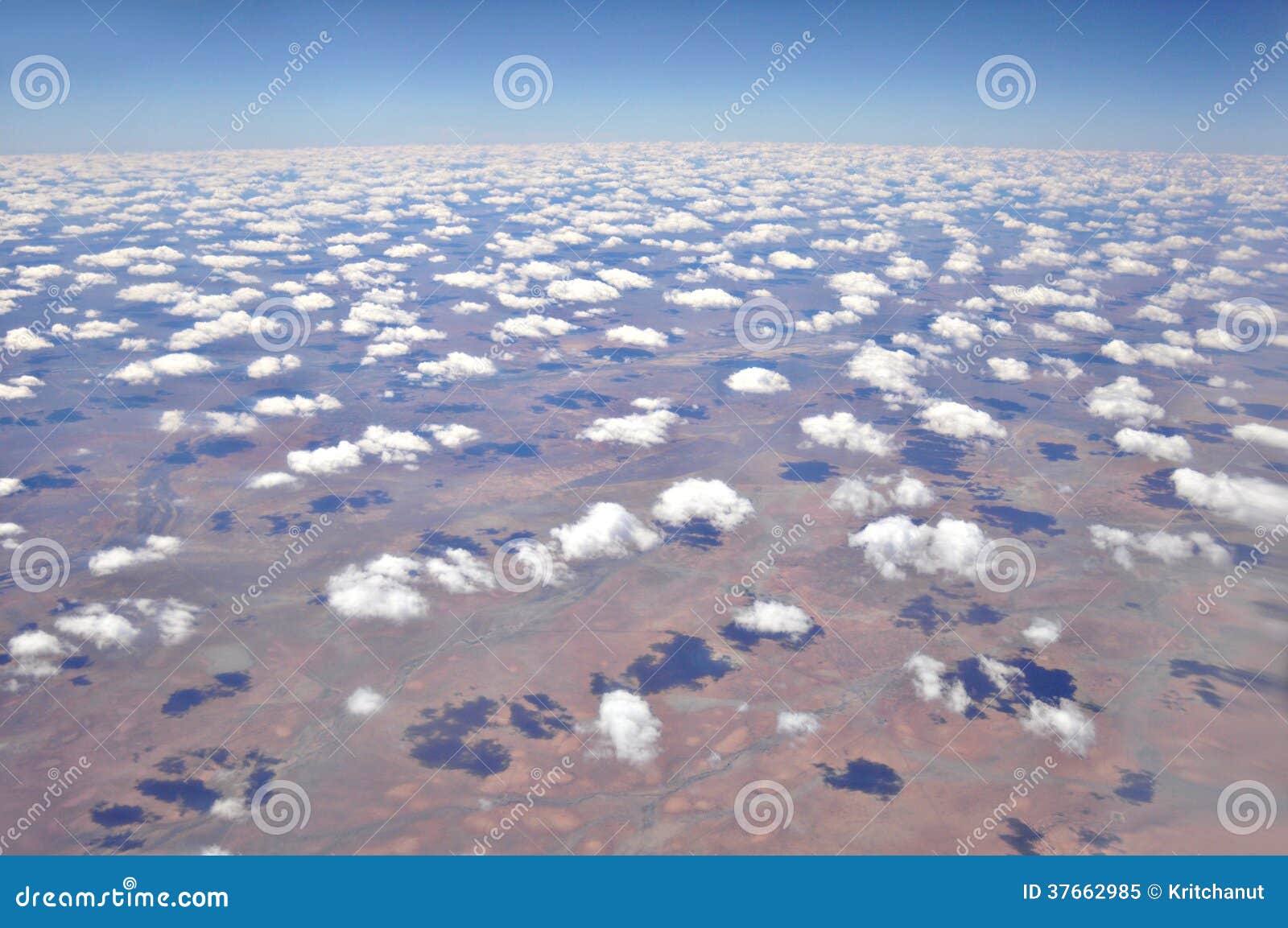 Aerial View of the Earth with Scattered Clouds in Blue Sky Stock Image ...