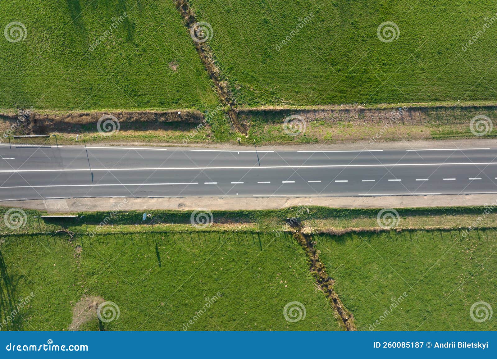 Aerial View of Empty Intercity Road between Green Agricultural Fields ... Aerial View of Empty Intercity Road between Green Agricultural Fields ...