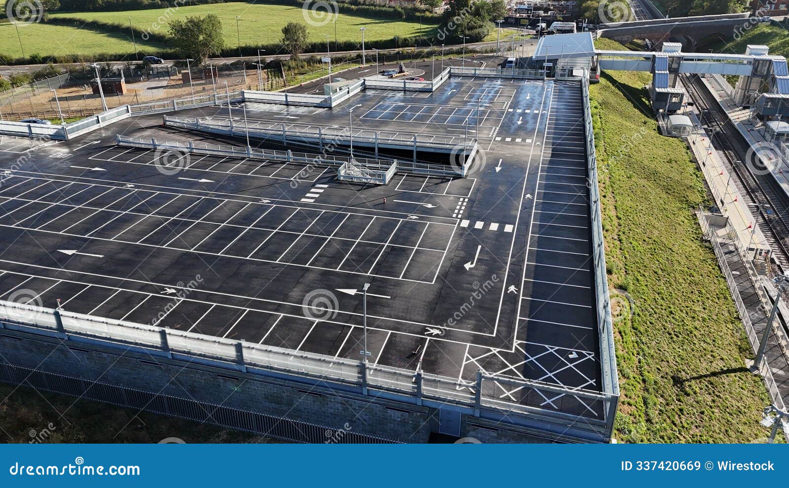 Aerial View of Empty Multi-level Parking Structure Near Railway Station ...