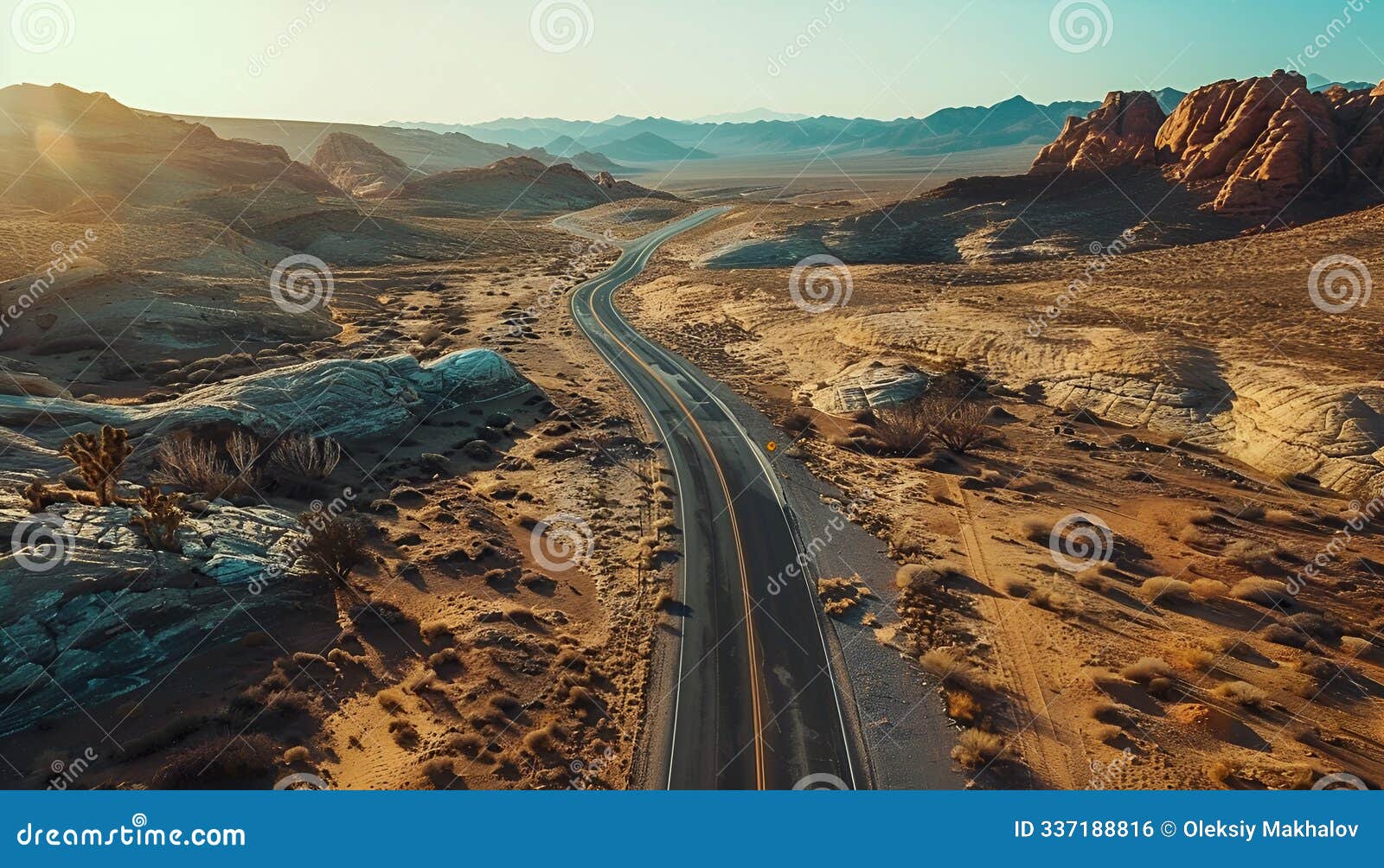 Aerial View of an Empty Road Passing through Remote Desert Landscape ...