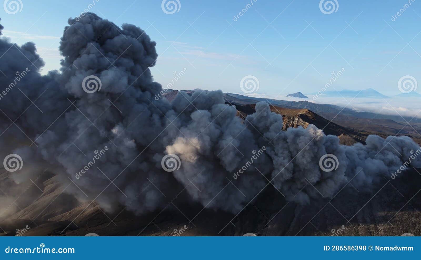 Aerial View of the Eruption of Ash Clouds by Ebeko Volcano. Northern ...