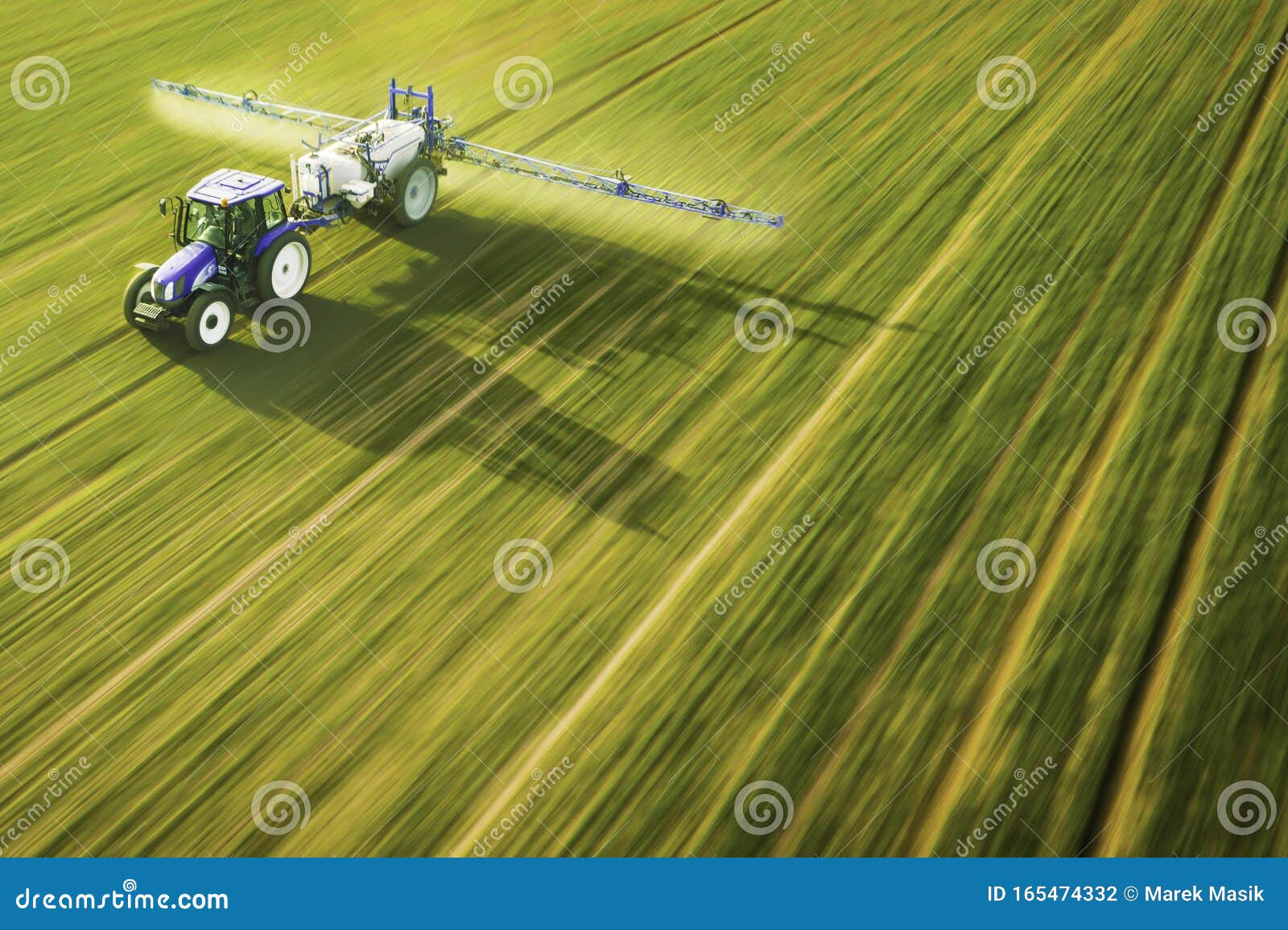 Aerial View of Farming Tractor Spraying on Field Stock Photo - Image of ...