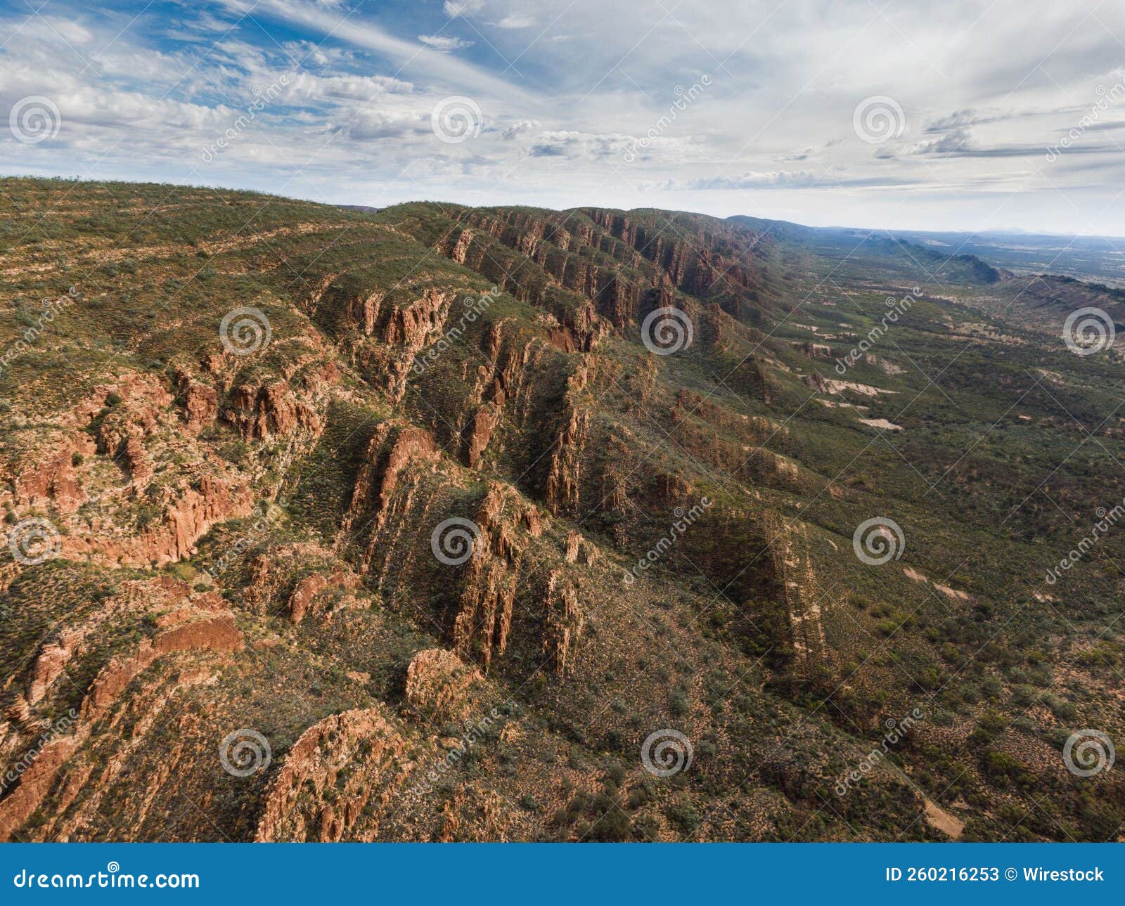 Aerial View of a Forested Cliff Landscape Under a Cloudy Sky Stock ...