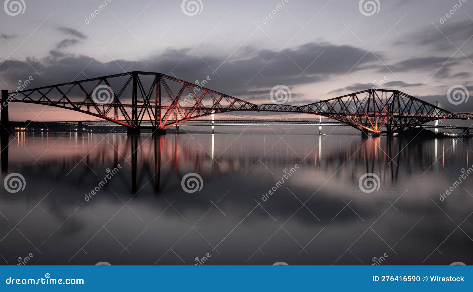 Aerial View of the Forth Bridge, Spanning a River and Illuminated with ...