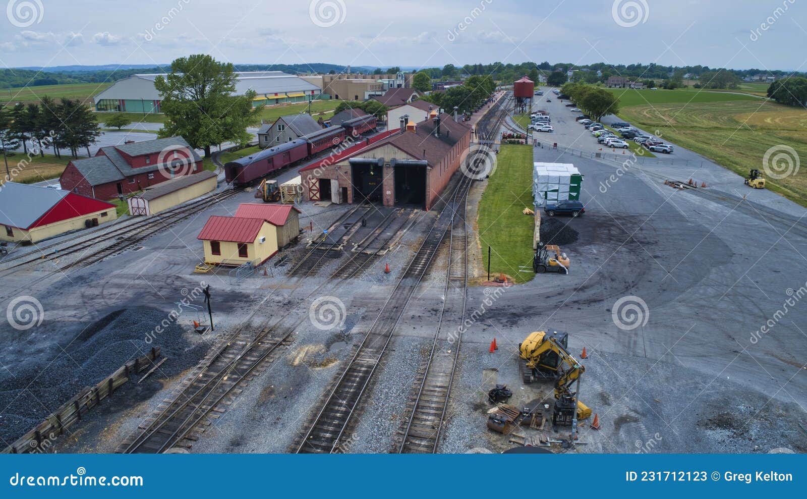 Aerial View of a Freight Yard with an Antique Steam Engine and Freight ...