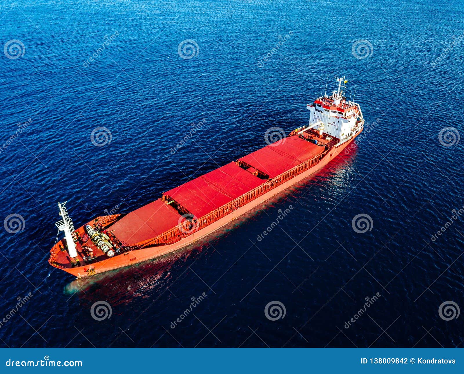Aerial View of General Cargo Ship in Blue Sea. View from Above of Red ...