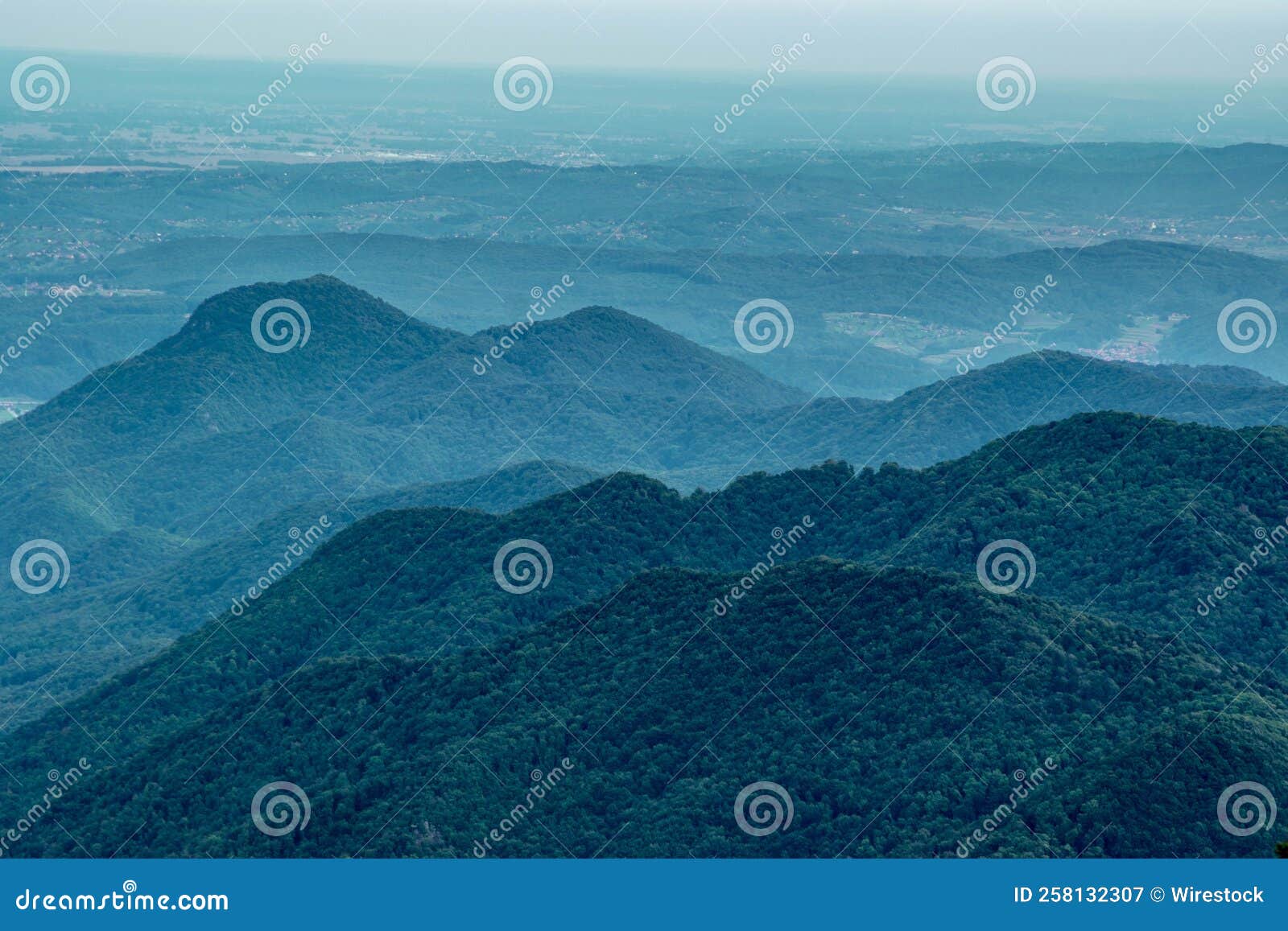Aerial View of Green Forested Mountains in a Mist Stock Image - Image ...