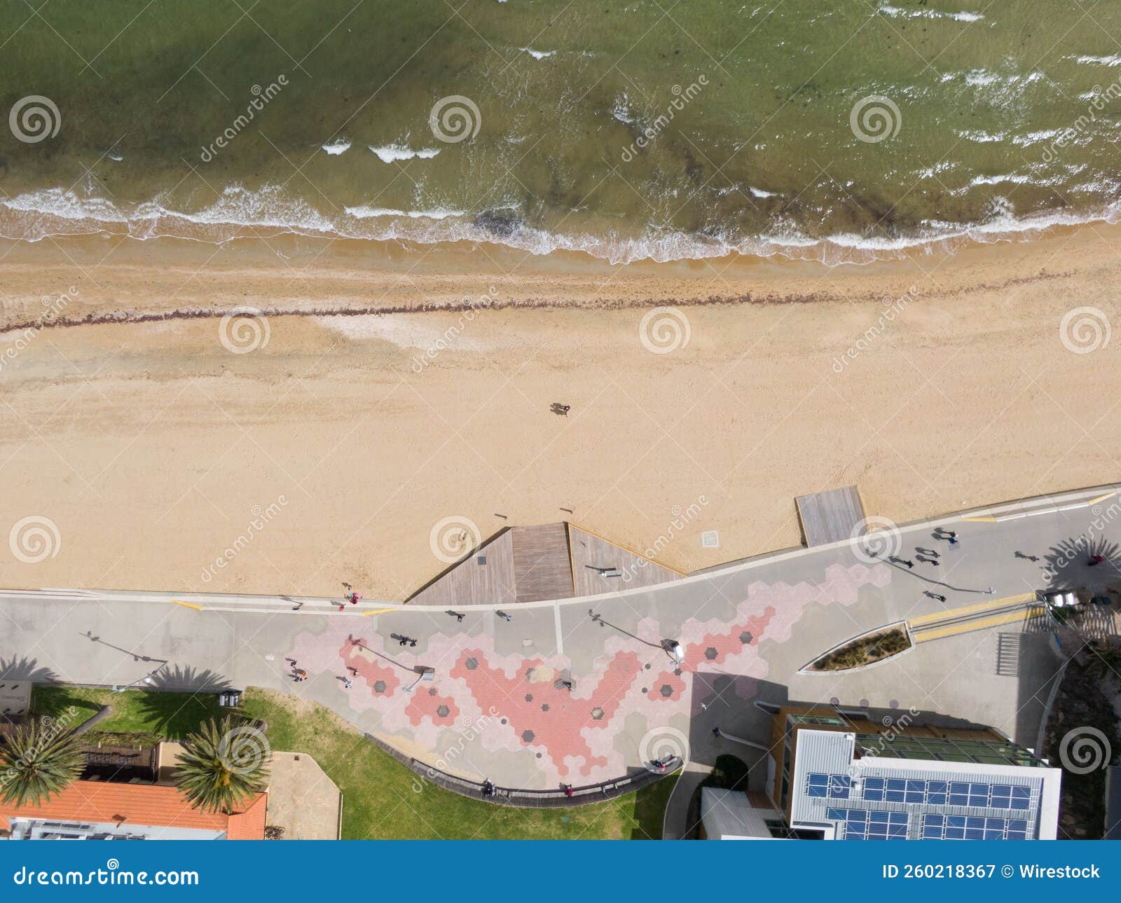 Aerial View of a Green Water Shoreline with a Sandy Beach Stock Image ...