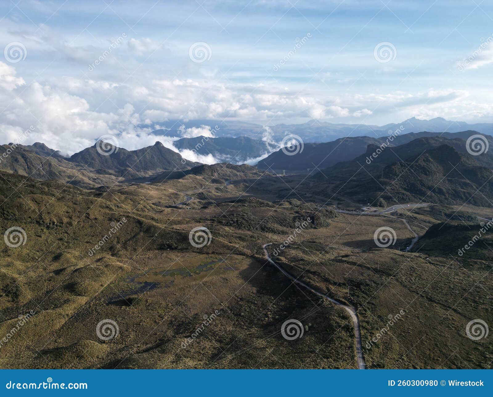 Aerial View of High Mountain Range in the Clouds Stock Photo - Image of ...