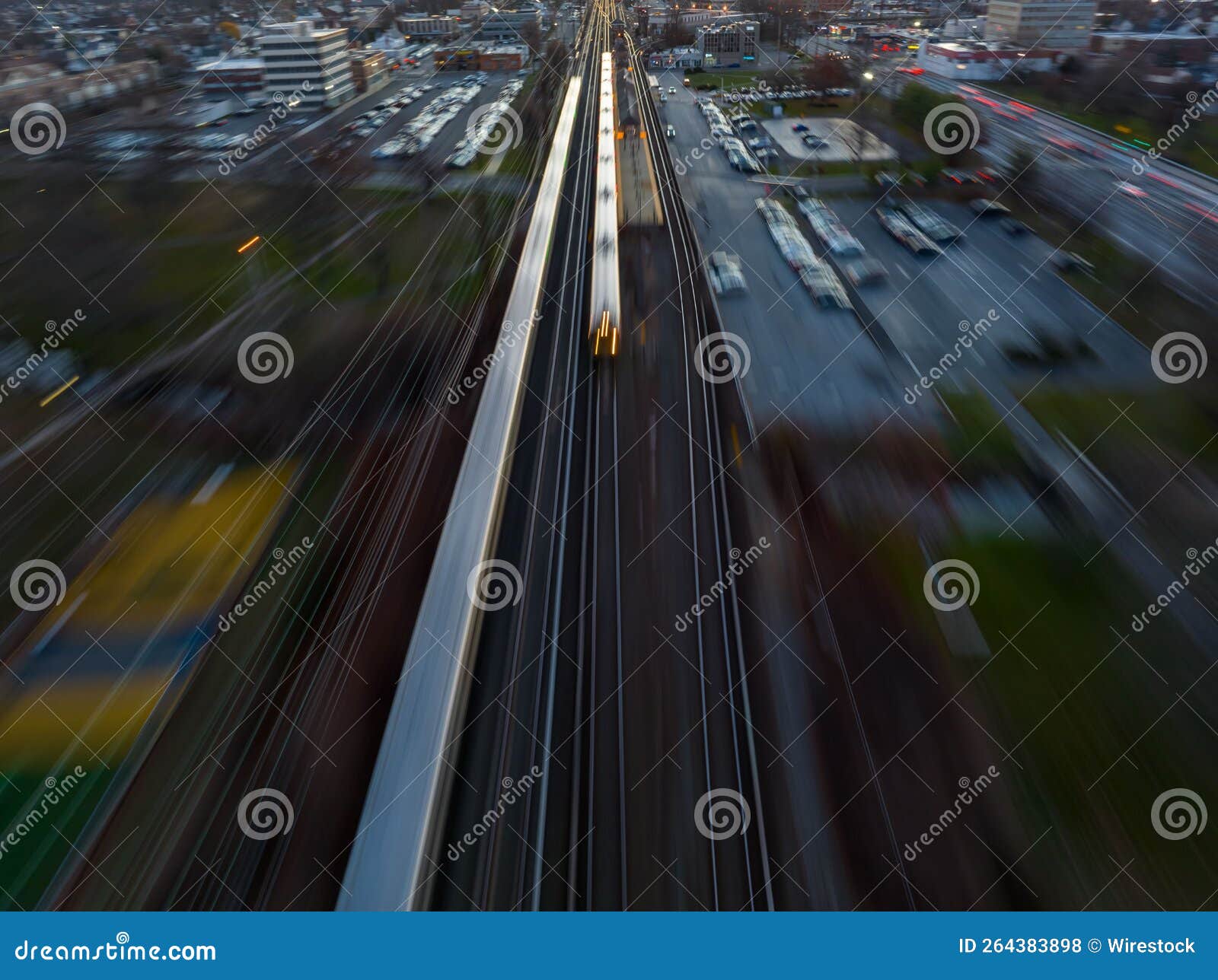 Aerial View of a High-speed Train in Motion on Tracks in the City Stock ...