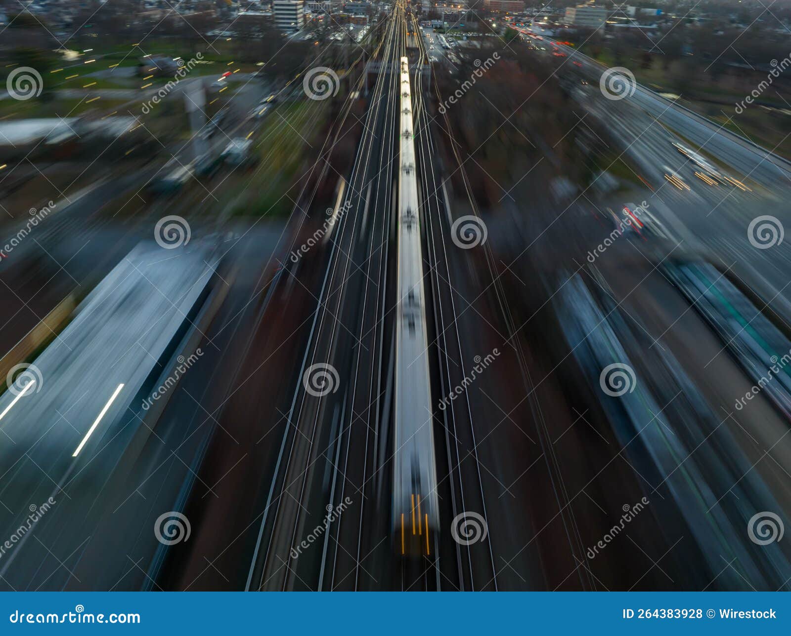 Aerial View of a High-speed Train in Motion on Tracks in the City Stock ...