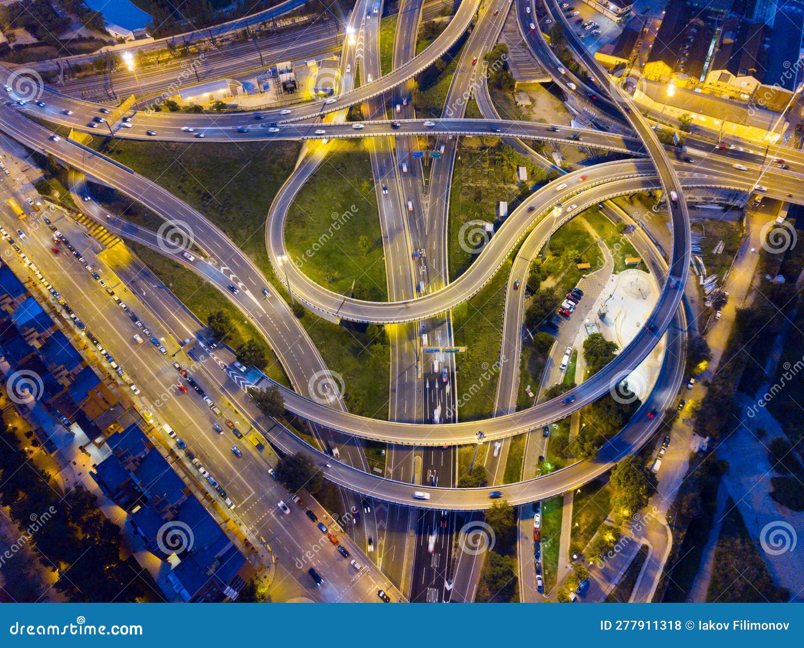 Aerial View of Highway Interchange at Dusk Stock Photo - Image of signs ...